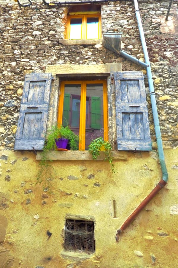 Mediterranean Stone Wall and Windows Stock Image - Image of window ...