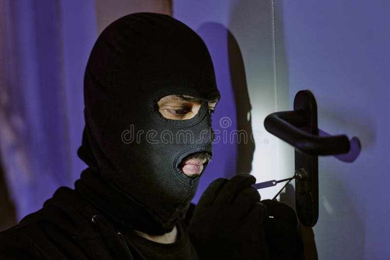 Man in Balaclava Picking Lock Stock Image - Image of unknown, night ...