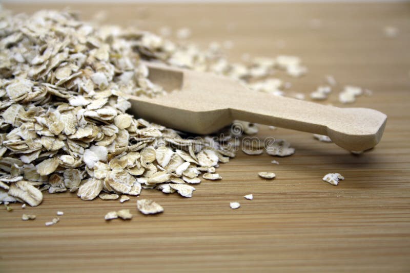 Medium-ground Oat Flakes on a Wooden Background Stock Photo - Image of ...