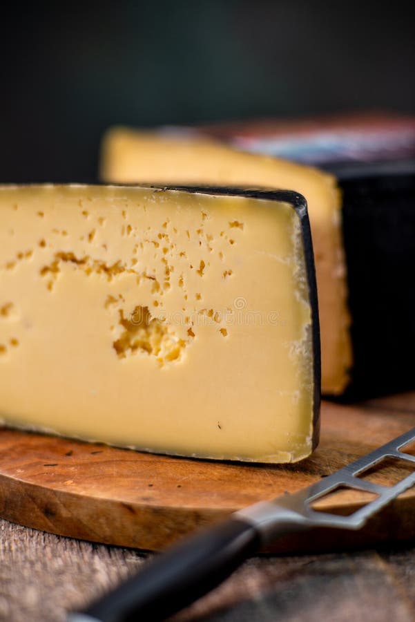 Medium Hard Cheese Head Gouda Edam on Wooden Board with Knife Wooden ...