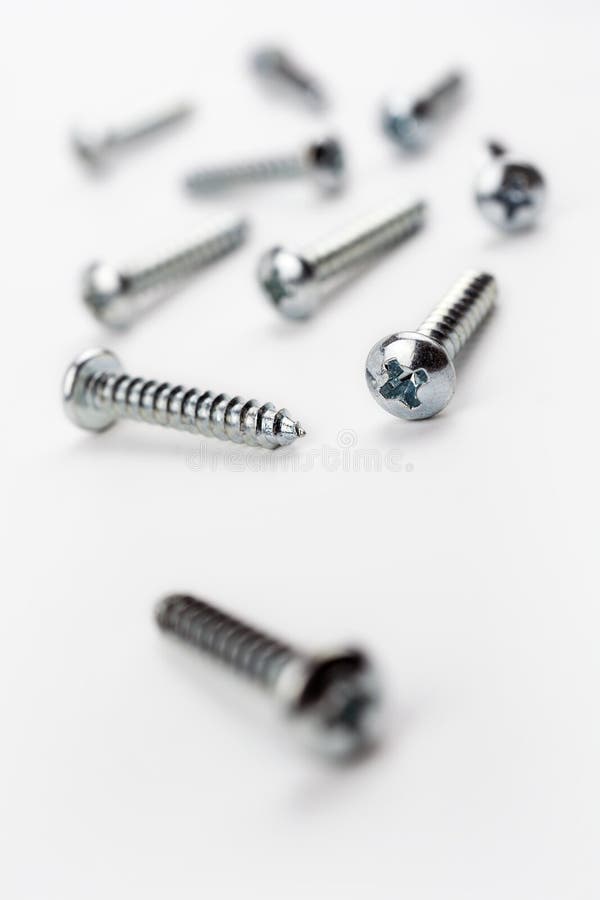 Medium Length Iron Screws In A White Box - Crooked Angle Stock Image ...