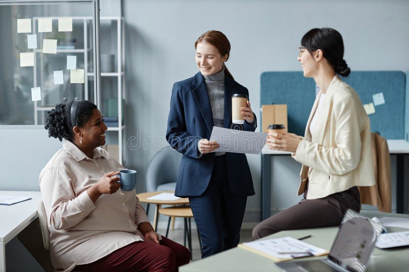 Cheerful Business Ladies Talking during Coffee Break Stock Photo ...