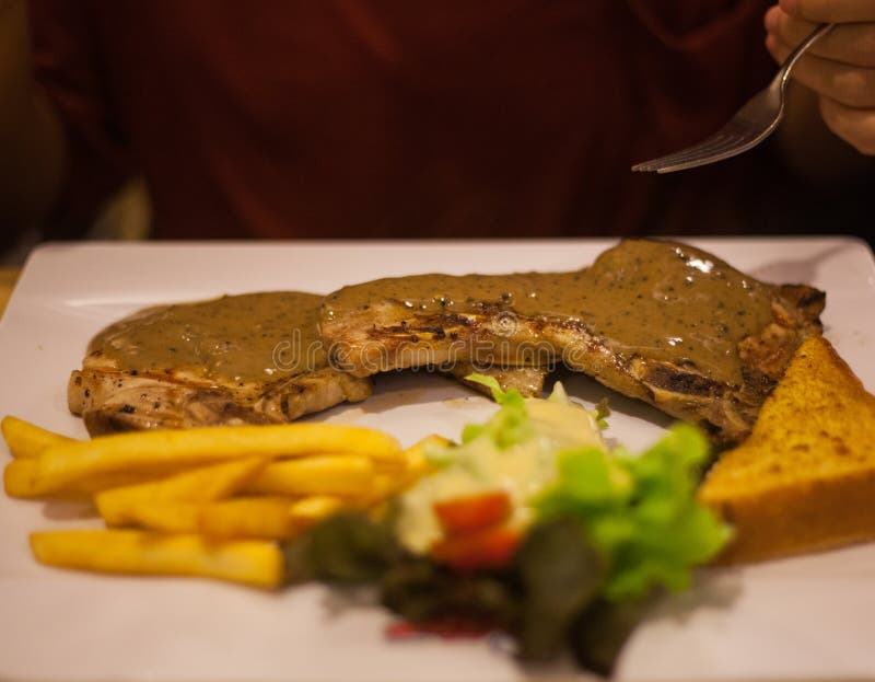 Medium Pork Chop Steak Dish Stock Photo - Image of organic, material ...