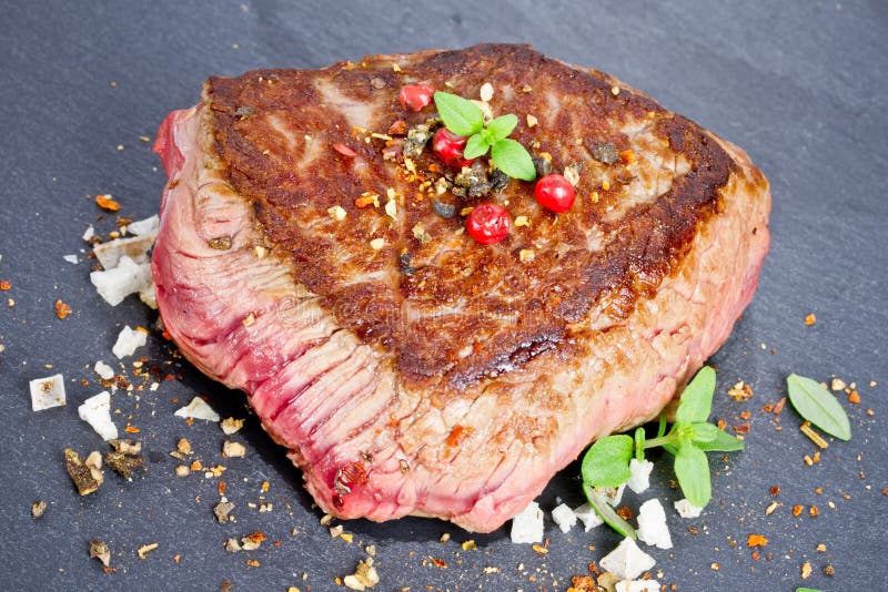 Grilled rare rump steak stock photo. Image of seasoning - 45212542