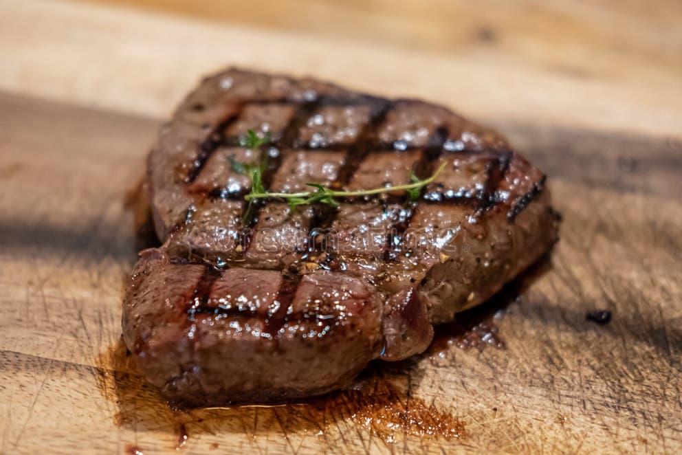 Medium rare meat on plate stock image. Image of chop - 282663227