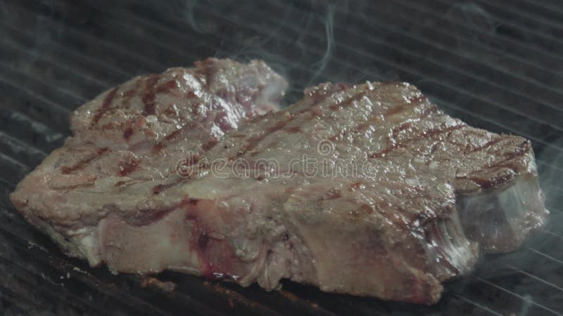 Medium-rare Piece of Beef Meat is Falling on a Frying Surface Stock ...