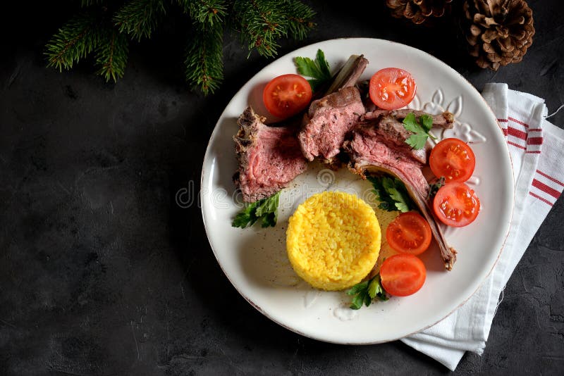 Medium Rare Rack of Lamb with Boiled Rice and a Salad of Cherry ...