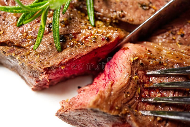 Medium Rear Beef Steak. White Plate with Piece of Beef Steak on Fork ...