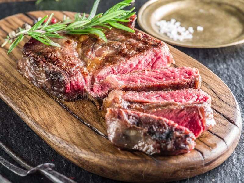 Medium Ribeye steak. stock image. Image of ribeye, knife - 74482257
