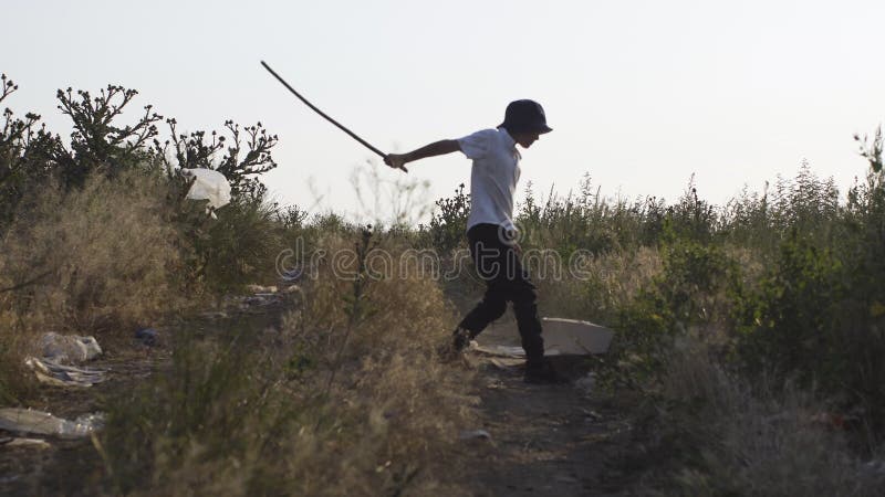 Angry boy walking in dump stock video. Video of abandoned - 153083035