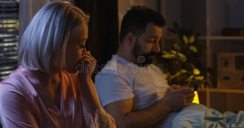Couple Crying in Bed at Night Stock Image - Image of home, evening ...