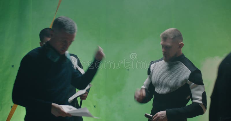 Crew Members Discussing and Actors Getting Ready for Shooting Stock ...