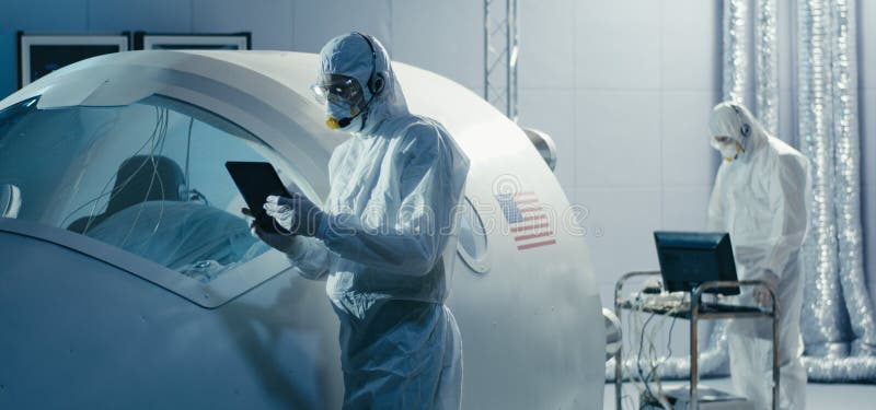 Engineer Using Tablet in Clean Room Stock Image - Image of male, gear ...