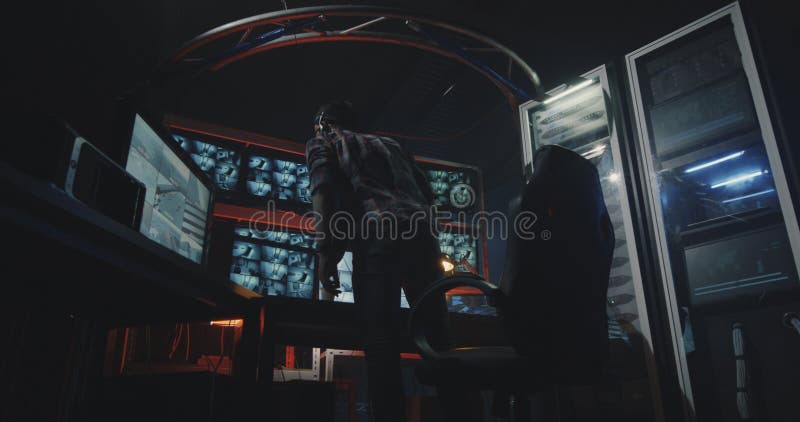 Hacker Watching Security Camera Footage Stock Image - Image of desk ...