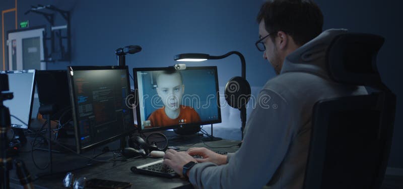 Programmer Talking with a Boy in a Video Call Stock Photo - Image of ...