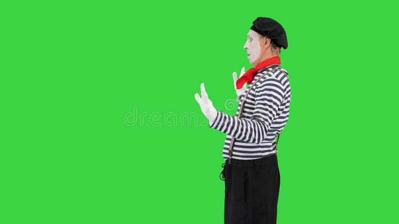 Mime Playing a Pantomime Performance Walking and Opening Imaginary Door ...