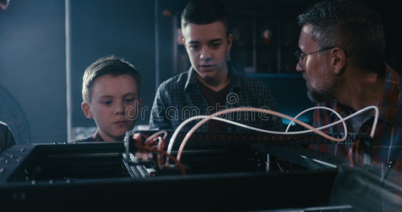 Teacher and Students Using 3D Printer Stock Footage - Video of boys ...