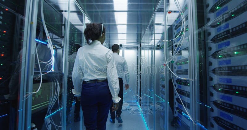Two Employees Performing Maintenance in a Data Center Stock Photo ...
