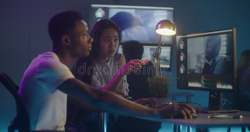 Video Editors at Work in Editing Room Stock Image - Image of studio ...