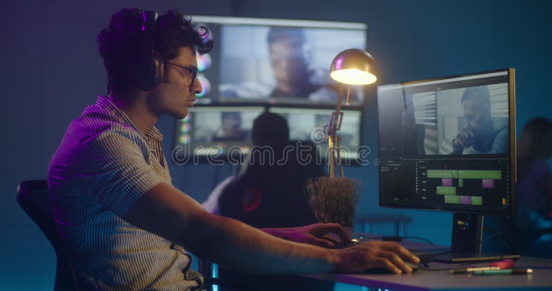 Video Editors at Work in Editing Room Stock Photo - Image of desk ...