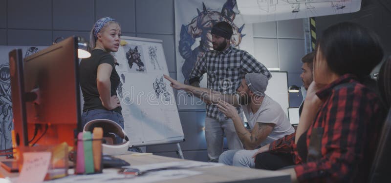 Video Game Developers Brainstorming Stock Image - Image of discussion ...