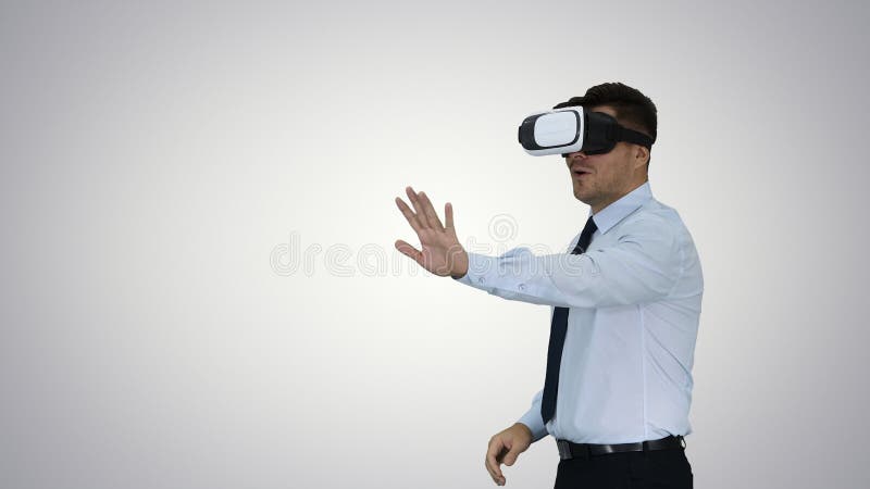 Businessman in Virtual Reality Headset Walking in Virtual World Stock ...
