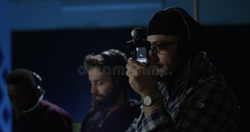 Young Director Giving Instructions on a Film Set Stock Image - Image of ...