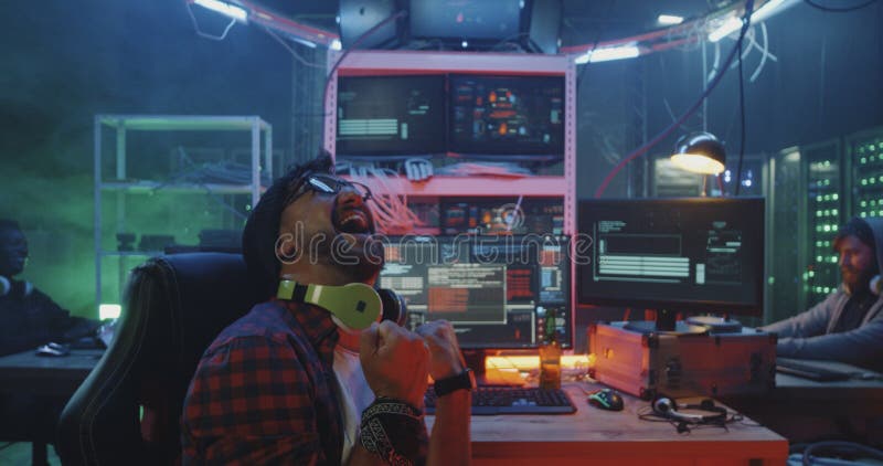 Hacker Laughing Then Glaring into Camera Stock Image - Image of ...