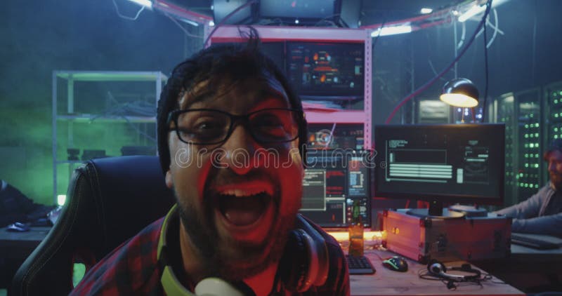 Hacker Laughing Then Glaring into Camera Stock Footage - Video of ...