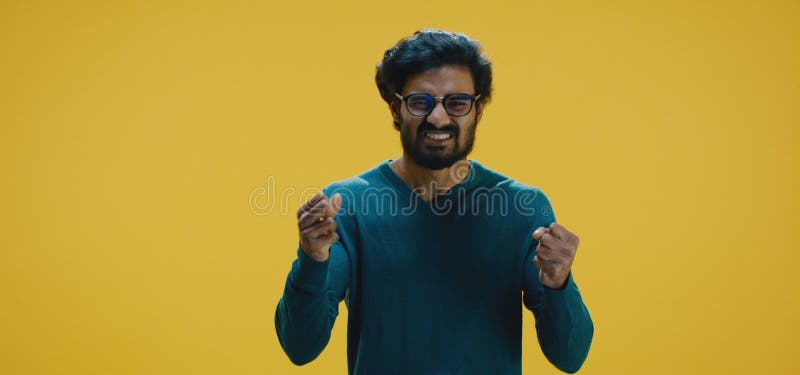 Young man angrily grasping stock image. Image of anger - 169537153