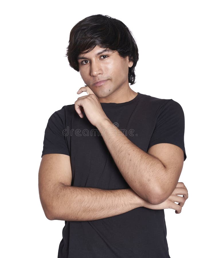 Medium Shot of a Young Man Posing for the Camera, One of His Hands is ...