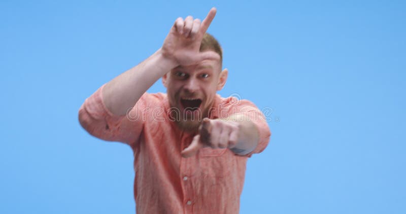 Young Man Taunting at Camera Stock Footage - Video of indoors, isolated ...
