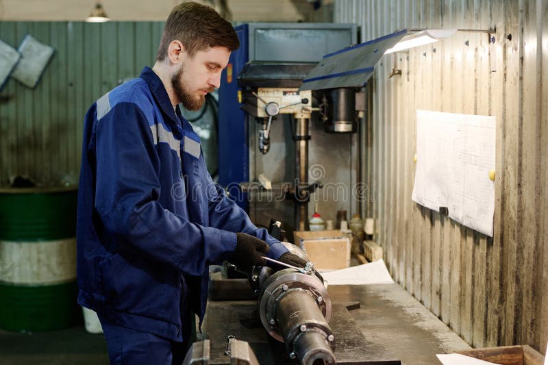 Male Engineer at Work Side View Stock Image - Image of repair ...