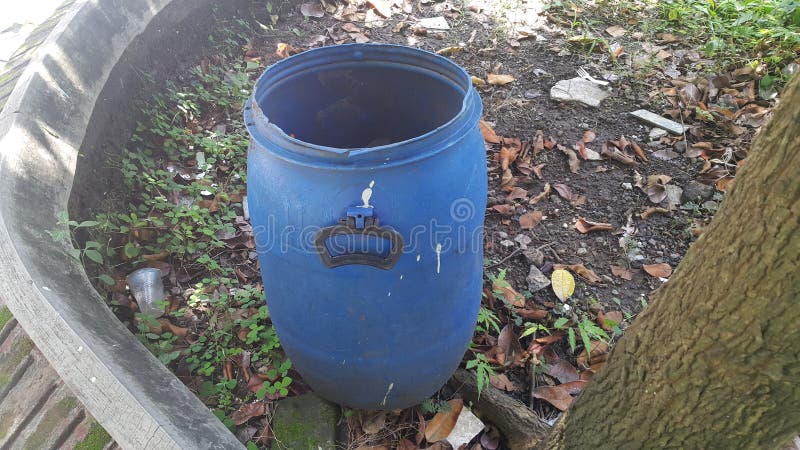 Medium Size Trash Can in the Yard Stock Image - Image of medium, yard ...