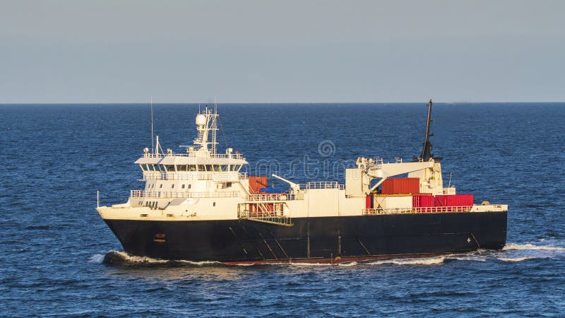 A Medium Sized Cargo Ship on the Sea Stock Photo - Image of vehicles ...