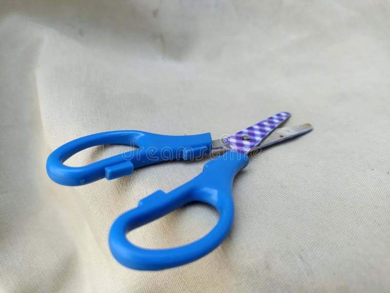 Medium Sized Paper Scissors with Light Blue Handles Stock Image - Image ...