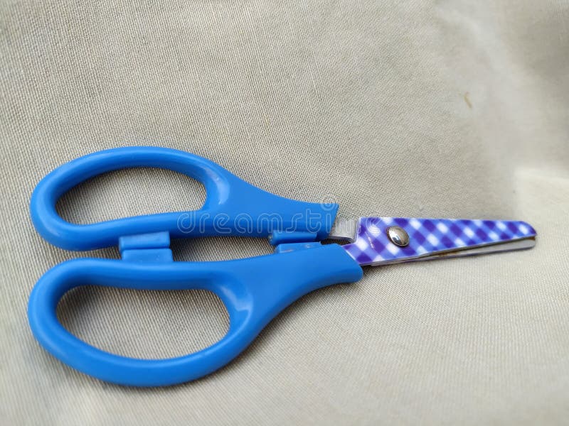 Medium Sized Paper Scissors with Light Blue Handles Stock Photo - Image ...