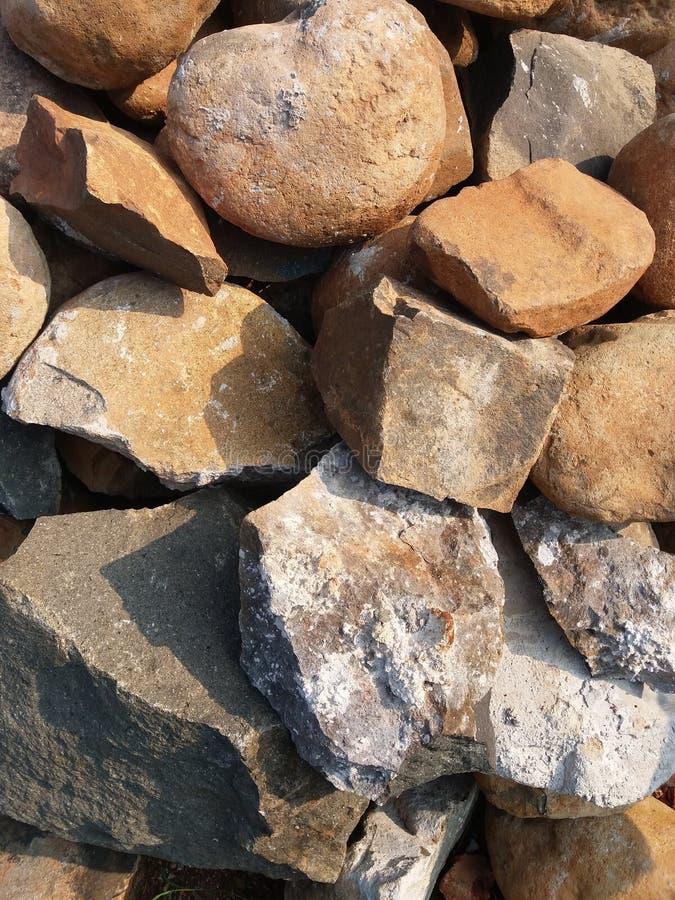 Medium-sized Piles of River Stones for House Foundations Create Unique ...