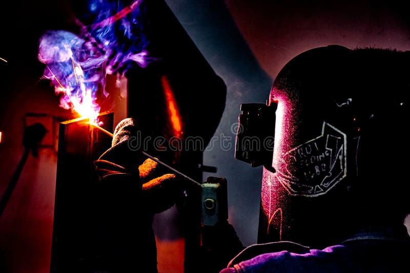 Medium View from the Side of Welding Process with Orange-purple-colored ...