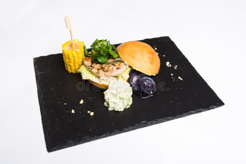 A Meet Burger Served with Cheese and Vegetables Stock Image - Image of ...