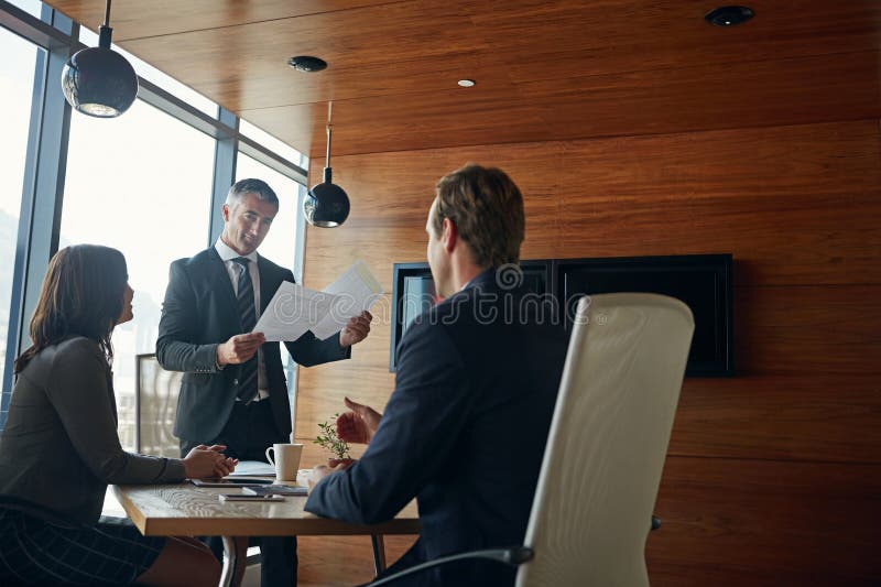 They Meet Regularly To Stay on the Same Page. a Team of Professionals ...