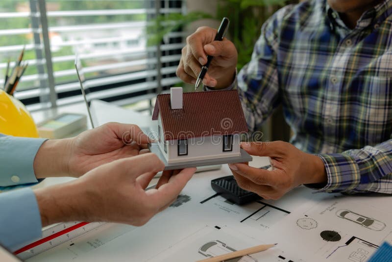 A Meeting of Architects Who Work Hard Together To Create Outstanding ...