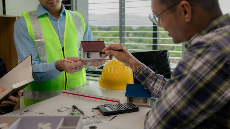 A Meeting of Architects Who Work Hard Together To Create Outstanding ...