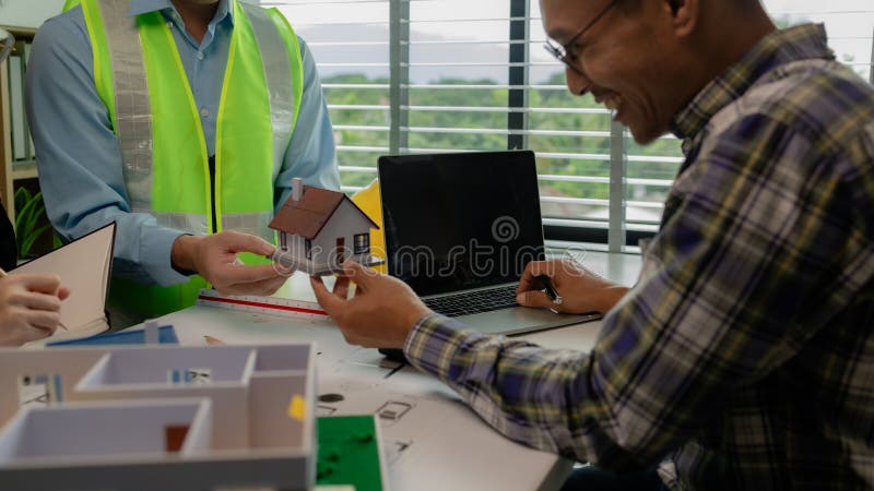 A Meeting of Architects Who Work Hard Together To Create Outstanding ...