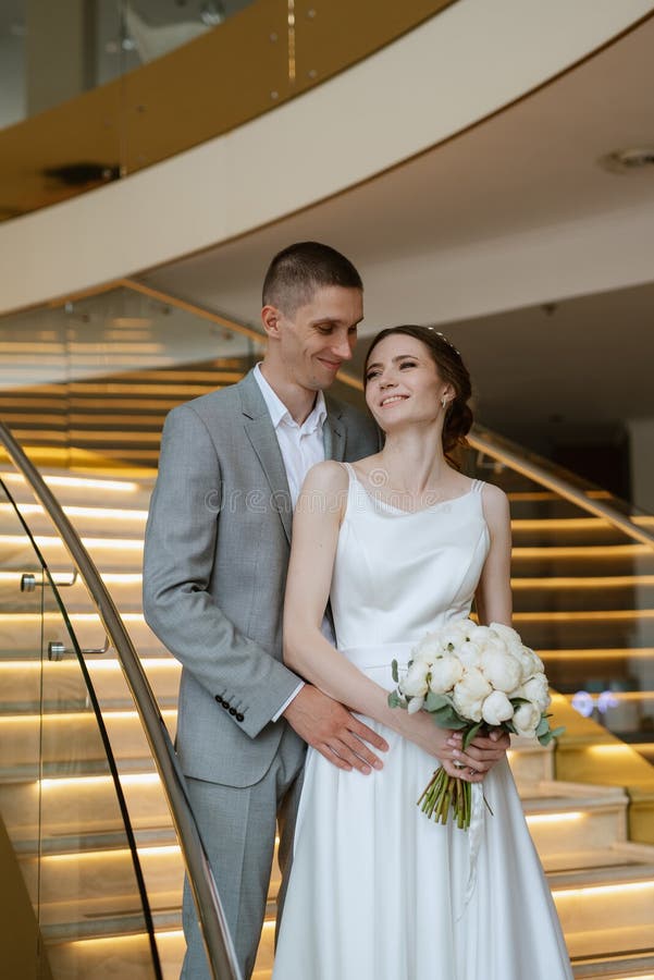 Meeting of the Bride and Groom on the Hotel Stairs Stock Image - Image ...