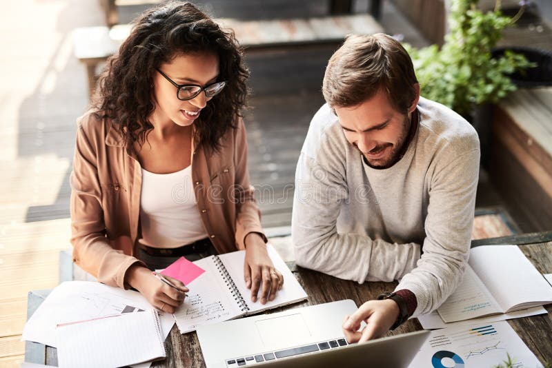 Meeting with a Change of Scenery. Two Designers Having a Meeting at a ...