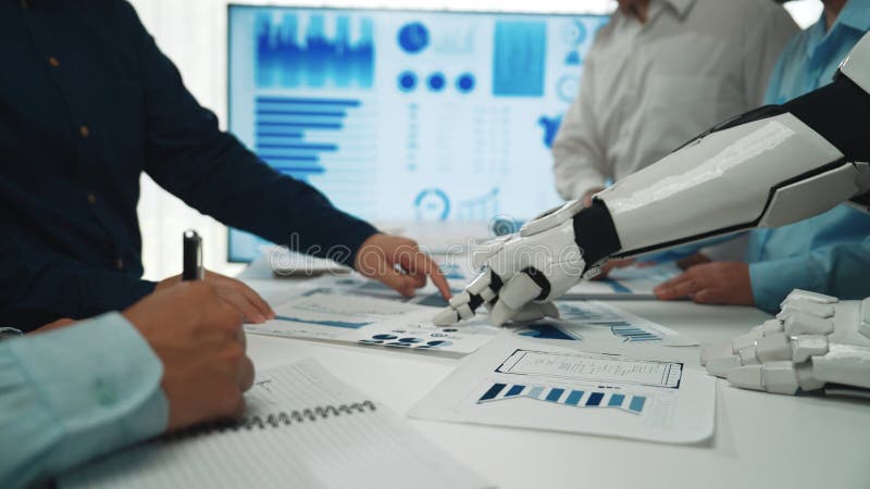 Meeting between Humans and Robots Discussing Business Analytics with Charts and Graphs in a ...