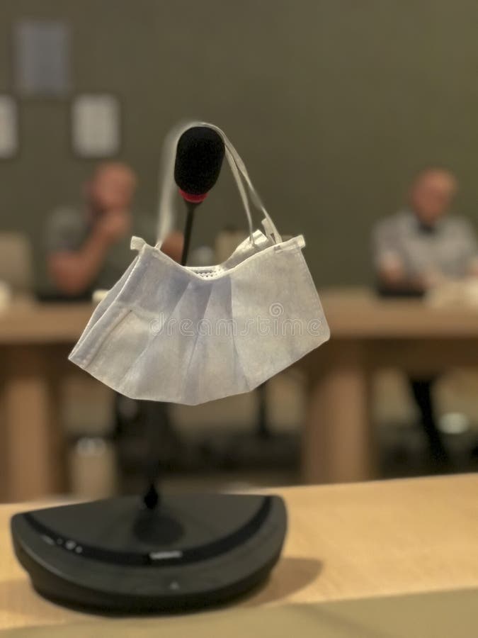 Meeting and Mask Hung on Microphone Stock Image - Image of color, hung ...