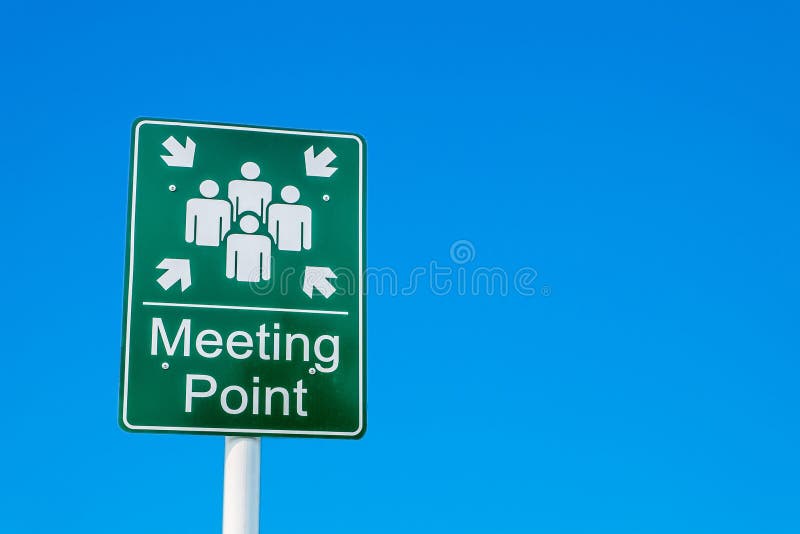 Meeting Point Green Sign Against a Blue Sky Stock Image - Image of ...