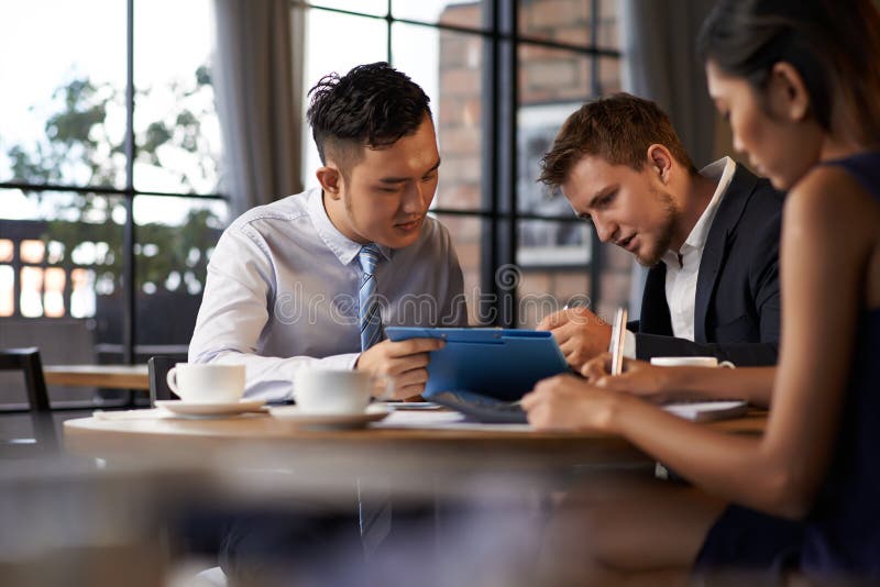 Meeting in restaurant stock image. Image of showing, cafe - 64058567